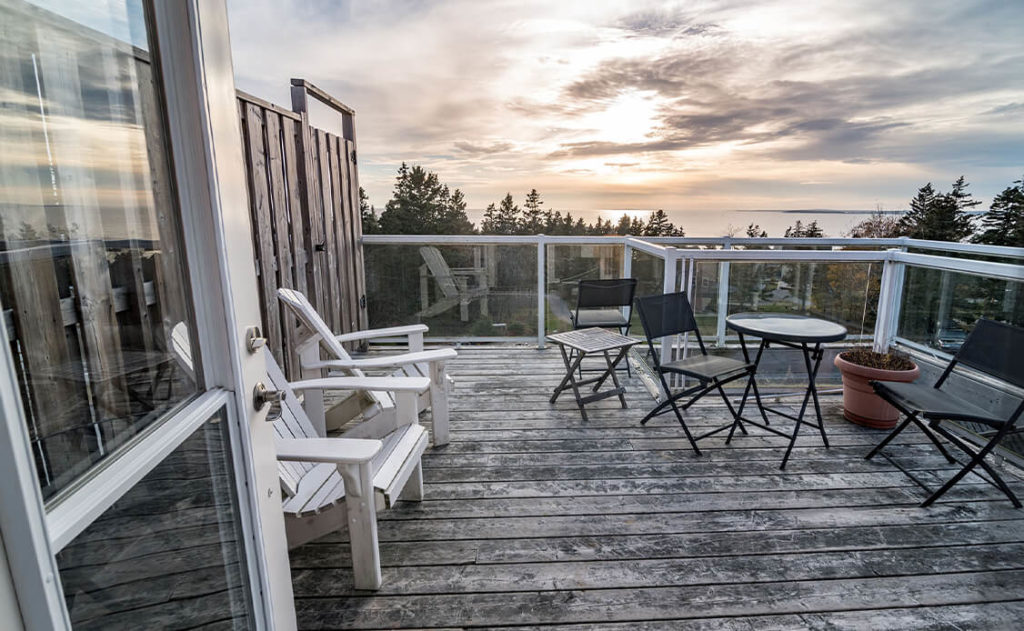 Get coastal-cozy in one of our guest rooms | Guest Rooms at Oceanstone